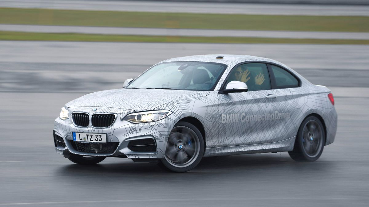 BMW unveils push-button parking and fast robot driving technology ...