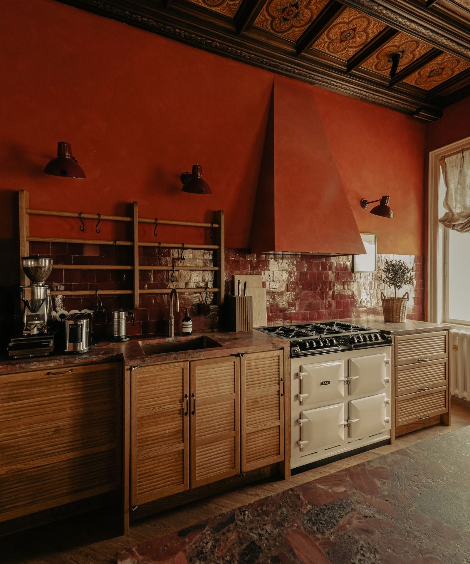 Tour this wooden kitchen with unexpected paprika red walls | Homes and ...