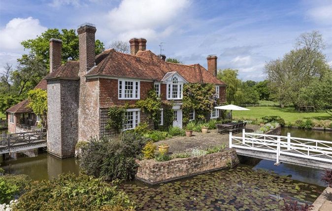 A 16th century home with a moat dug by hand by a former resident ...
