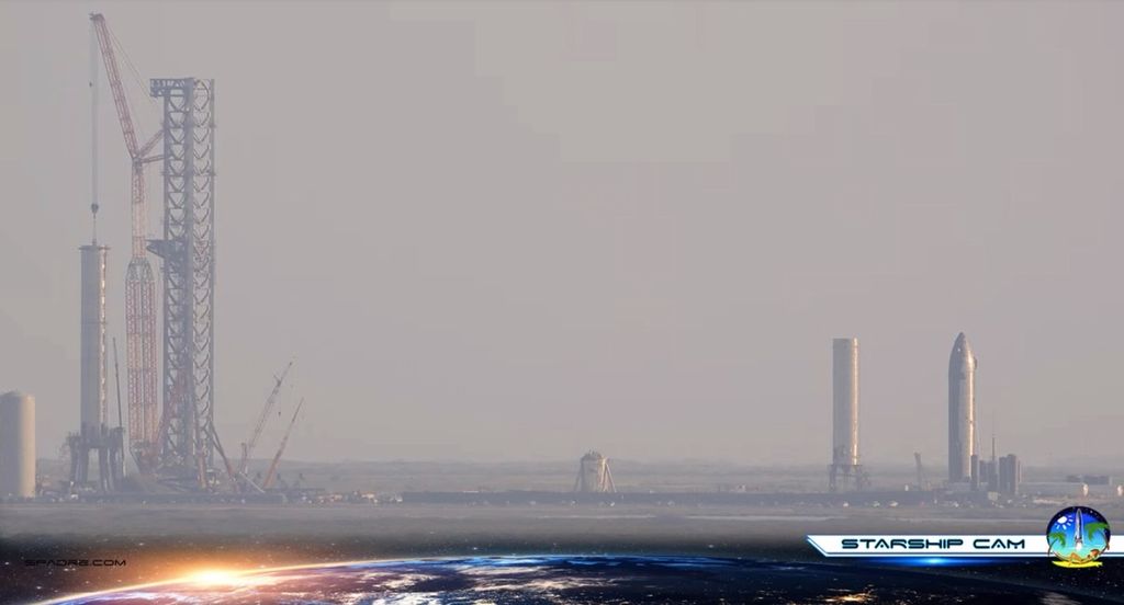 SpaceX lifts giant Super Heavy rocket onto launch stand again (photos ...