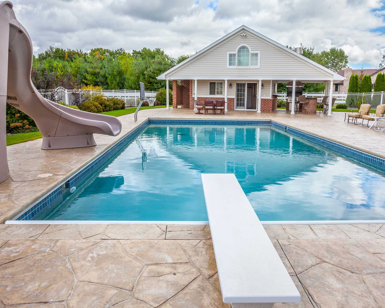 Pool slide ideas: 9 refreshing features to up the fun factor | Gardeningetc