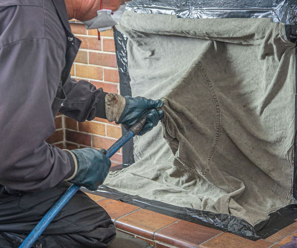 Your complete guide to blocking up a fireplace | Homebuilding