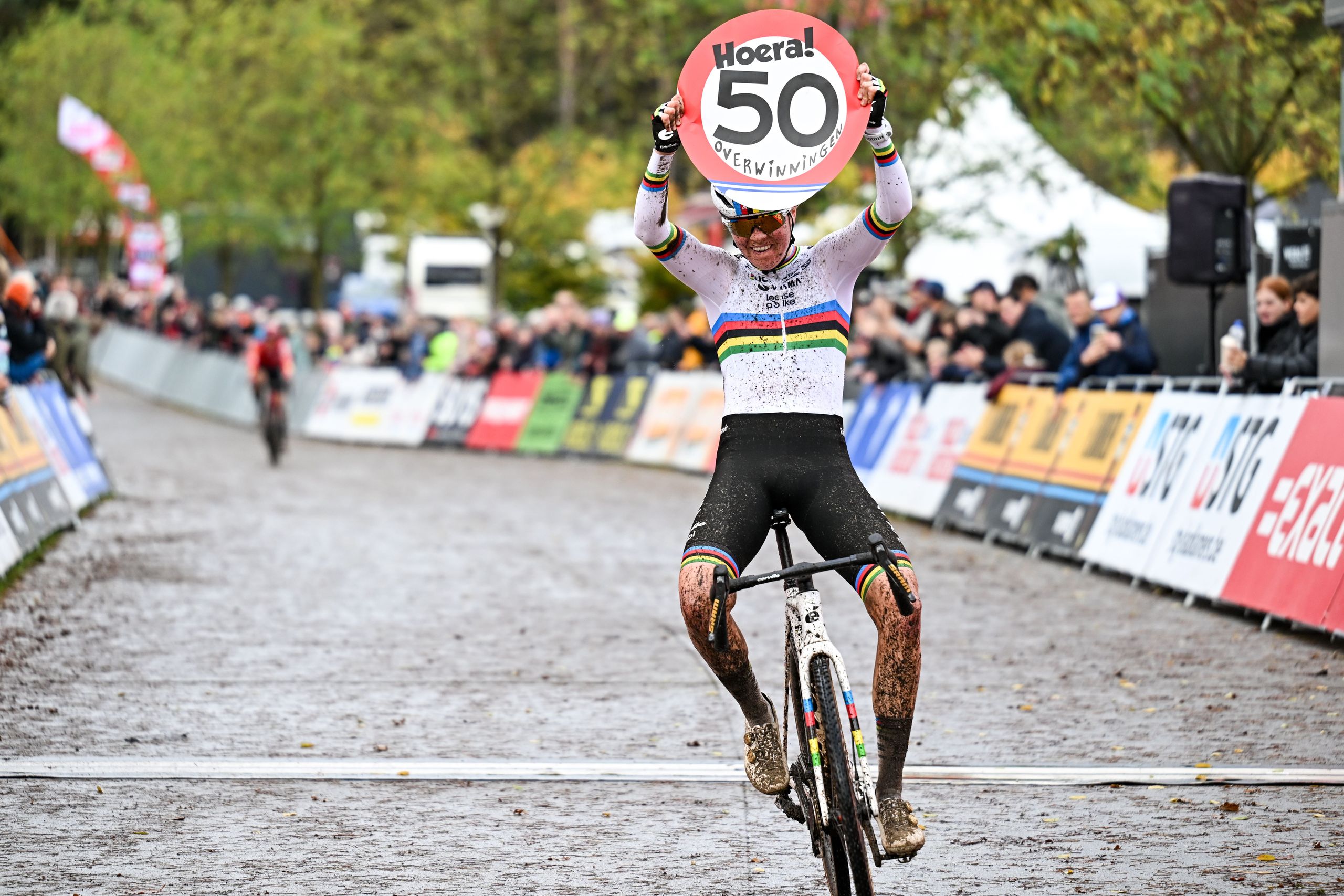 Fem van Empel celebrates 50th cyclocross victory at muddy Exact Cross ...
