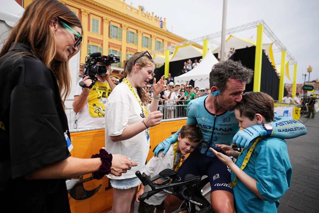 Mark Cavendish ends 17-year Tour de France career surrounded by family ...