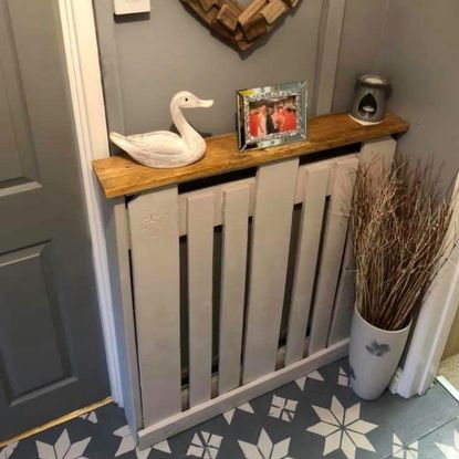 Homeowner upcycles free wooden pallet into a bespoke radiator cover ...