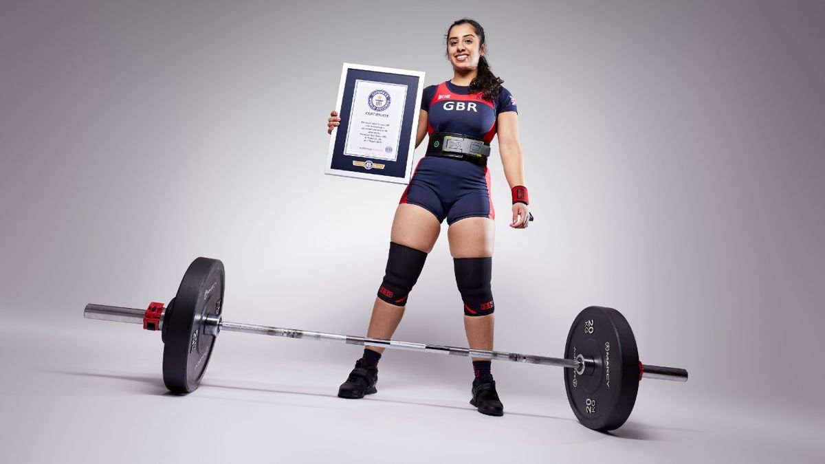 This British Woman Holds The Guinness World Record For Most Bodyweight Squats In One Minute | Coach