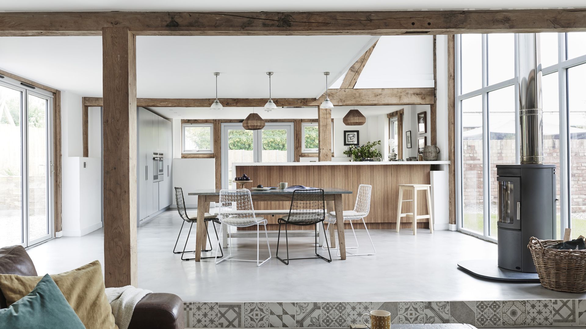 Discover how two listed barns were restored to create a modern, lighted ...