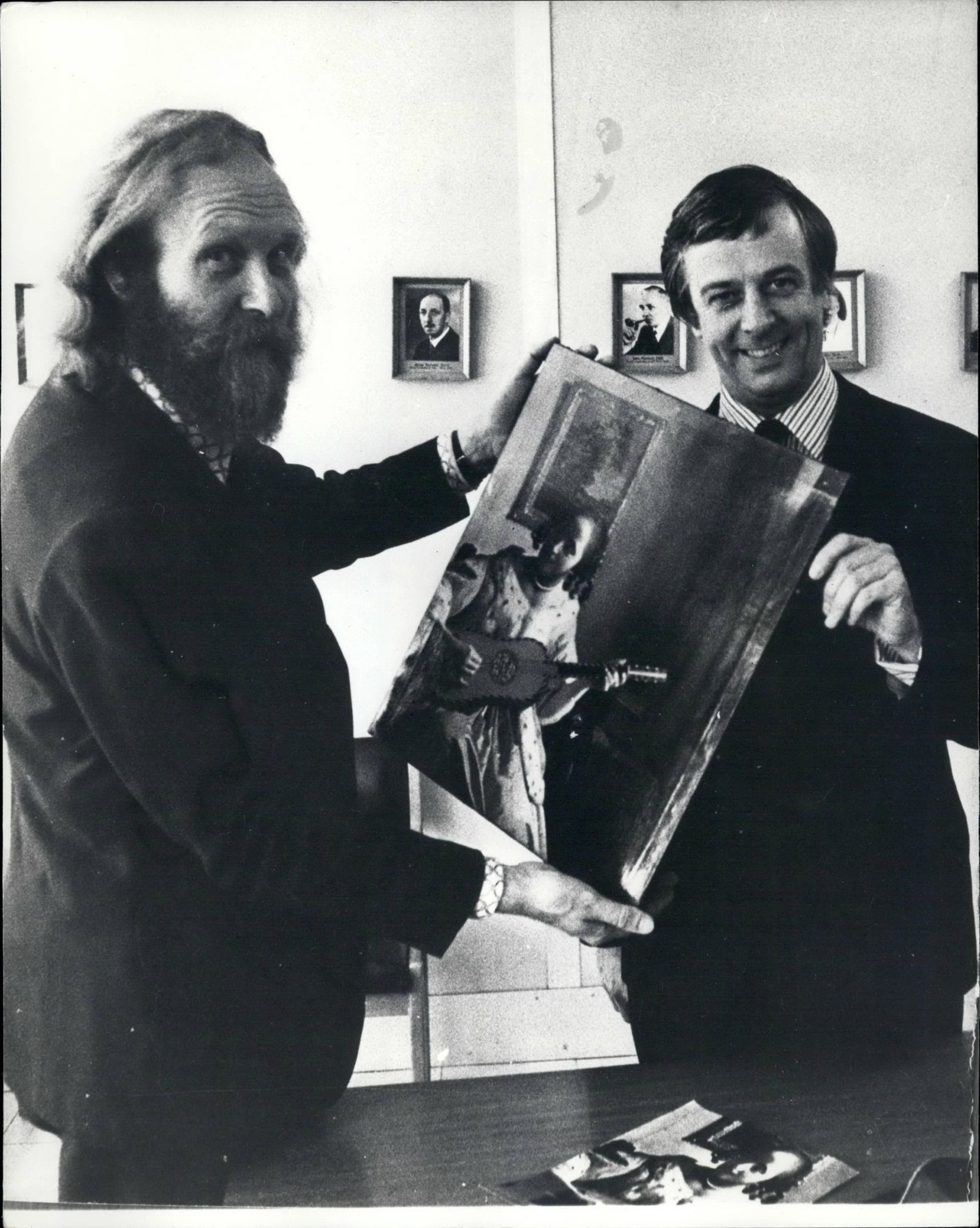 A painting owned by Edward Guinness is on display next to a near ...