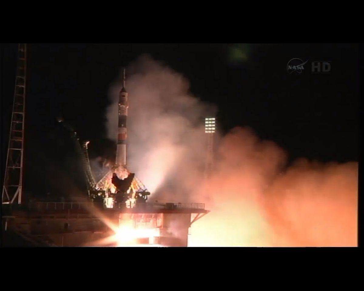 Soyuz Rocket Launches Space Station Crew on Express Trip: (Expedition ...
