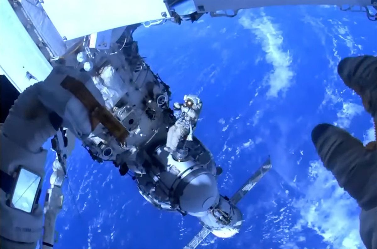Russian cosmonaut becomes 1st to ride European robotic arm on ISS spacewalk | Space
