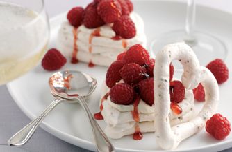 Pistachio and raspberry meringue love hearts | Dessert Recipes | GoodtoKnow