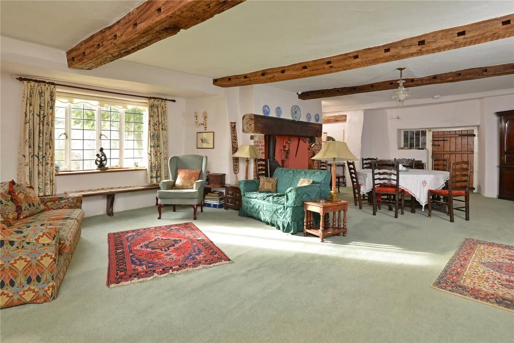 One of Devon's oldest houses, with thatched roof, kitchen garden and ...