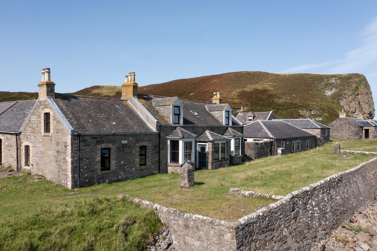 A Scottish island for sale with seals, seven houses, a lighthouse and ...