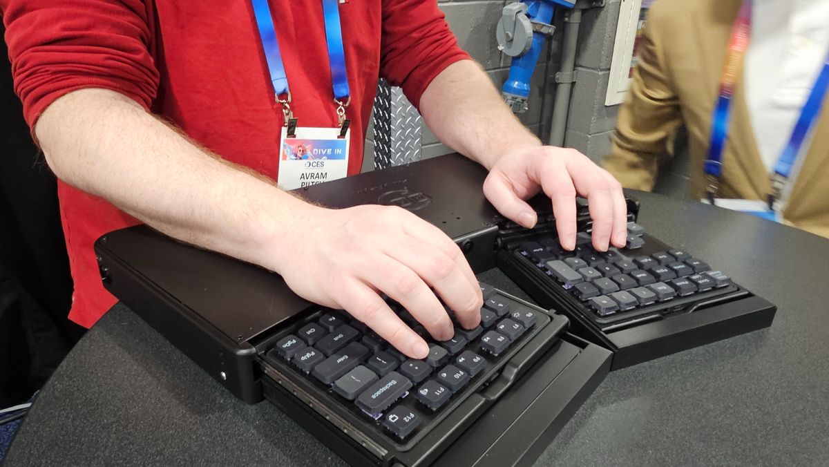 Raspberry Pi 5 powers motorized keyboard that changes layout based on ...