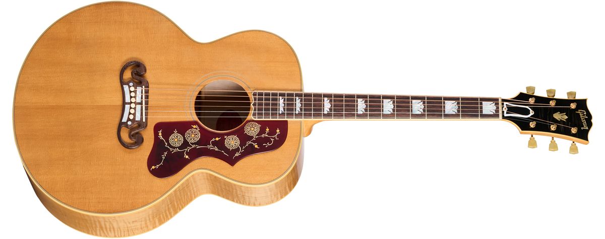 “Light lacquer checking, light dings, pick trails, and rounded ...