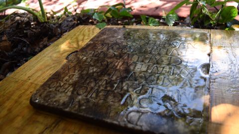 Ancient Roman tombstone found beneath undergrowth in New Orleans yard ...