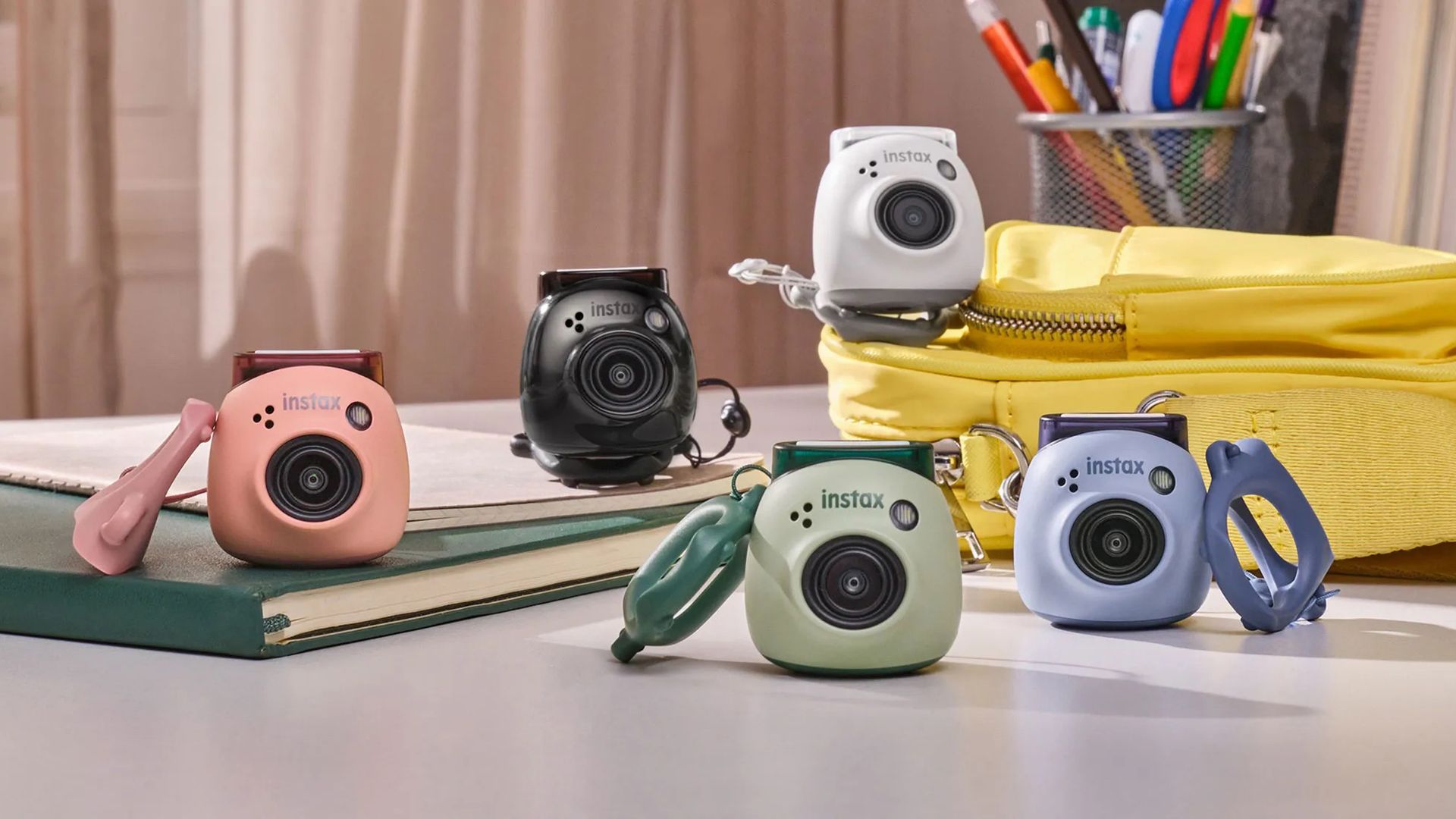 The tiny Instax Pal is a go-anywhere digital camera, with optional ...