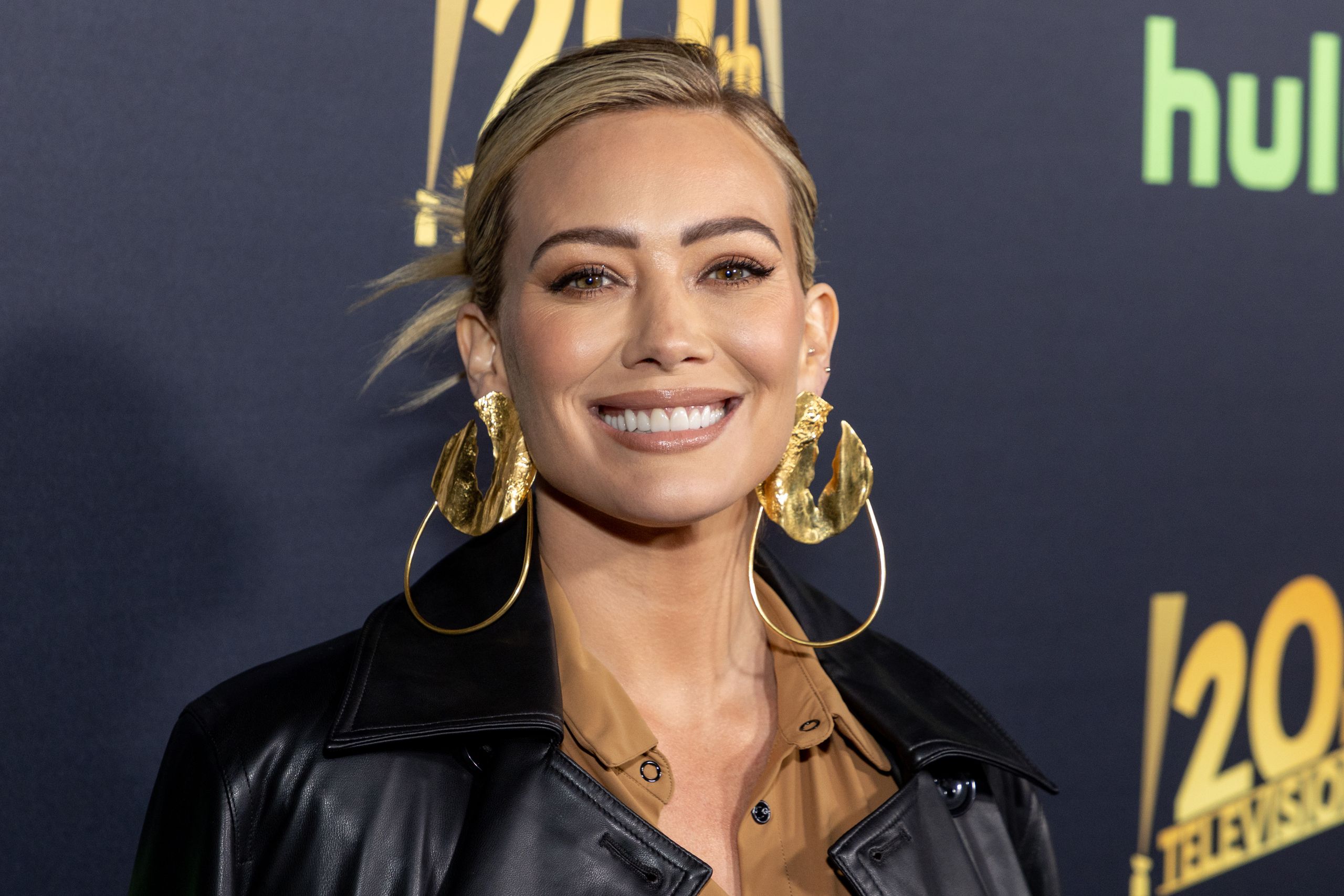 Hilary Duff Wears Sparkly ASTR Coat for 'Kelly and Ryan' Appearance ...