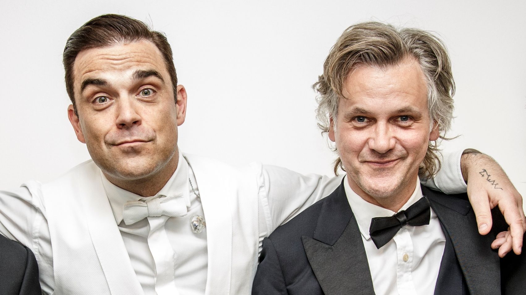 Which of Robbie Williams' songs did Guy Chambers write? | Woman & Home