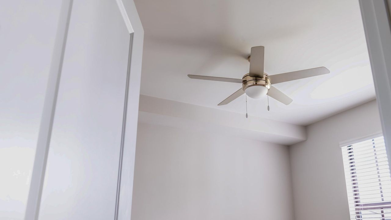 Is your ceiling fan spinning the wrong way? This quick…