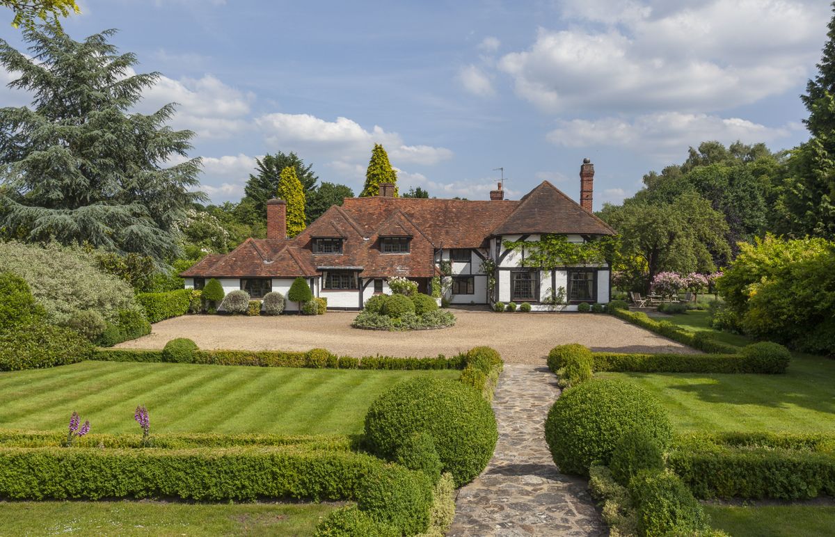 A pretty equestrian property in Surrey, with stables fit for equine ...
