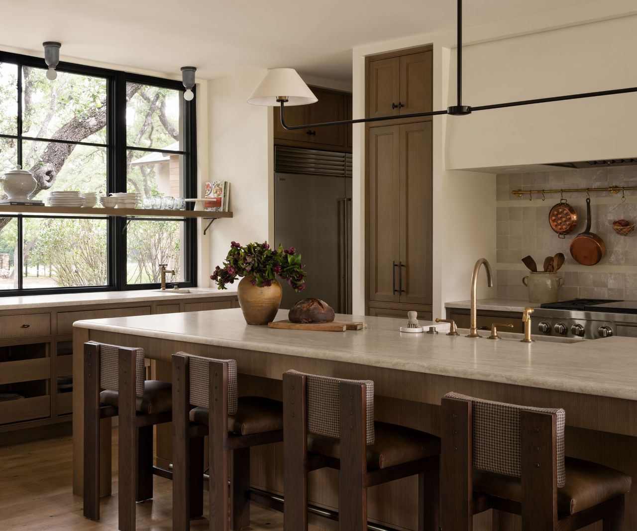 A wood kitchen by Shea McGee expertly brings the outdoors in | Homes ...