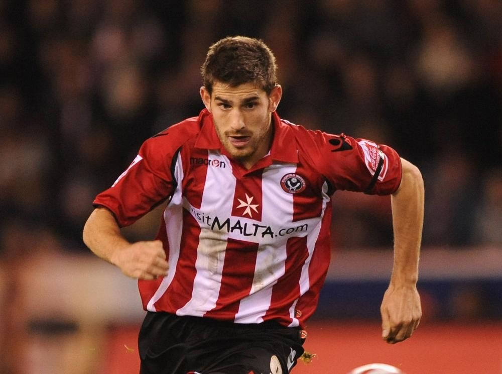 Oldham pull out of deal to sign striker Evans | FourFourTwo