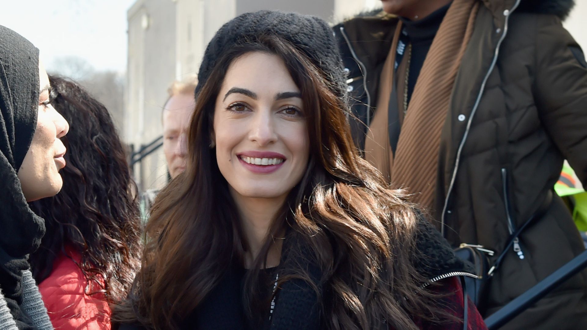 Amal Clooney layers up against the cold in cosy tartan jacket, leather trousers and chic biker ...