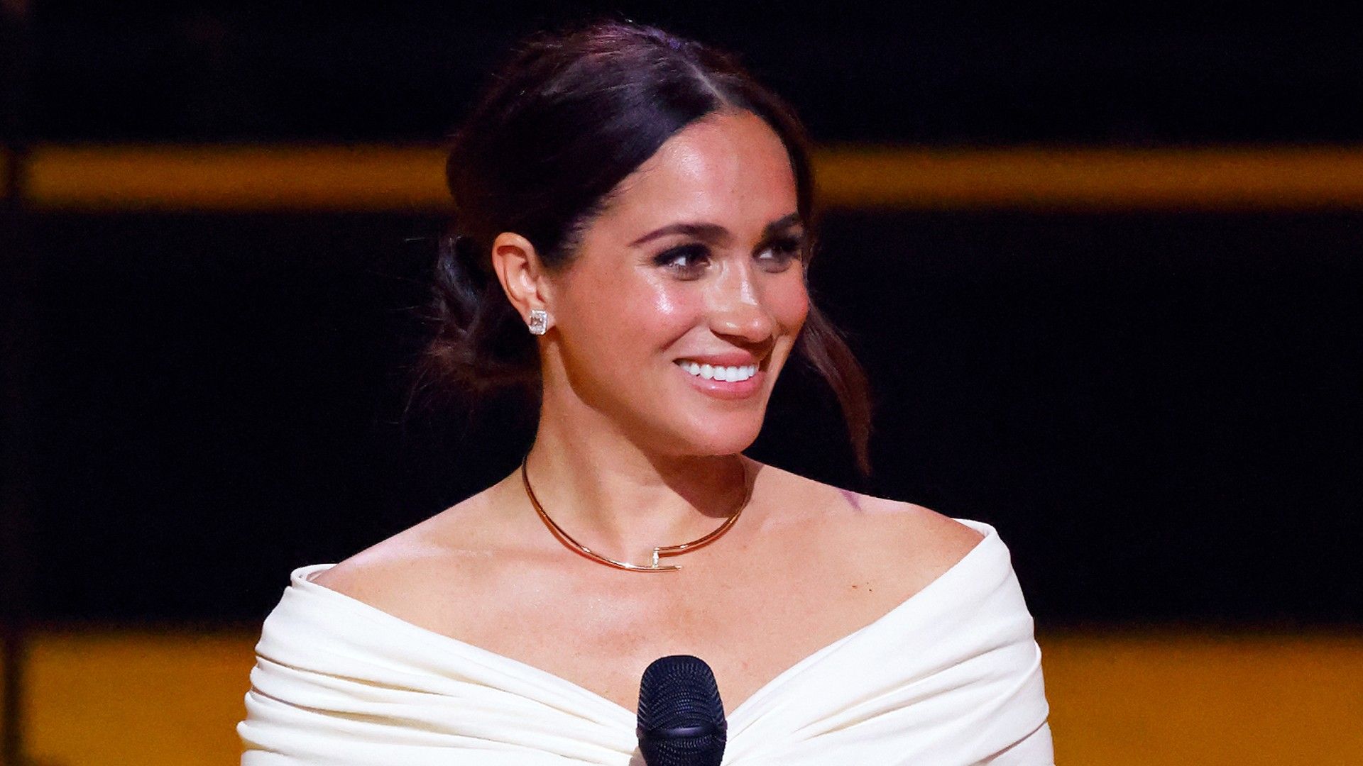 Meghan Markle wears pearl earrings and sleek bun to surprise pregnant women | Woman & Home