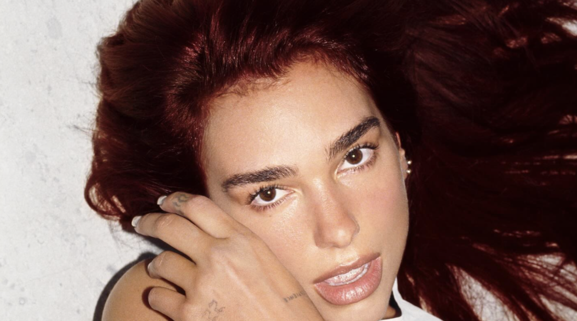 Dua Lipa Just Debuted Dark Cherry Red Hair | Marie Claire