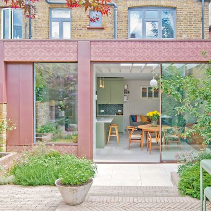 Bespoke cladding on this extension is the perfect finishing touch ...