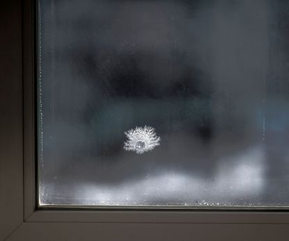 What causes frost on the inside of windows?