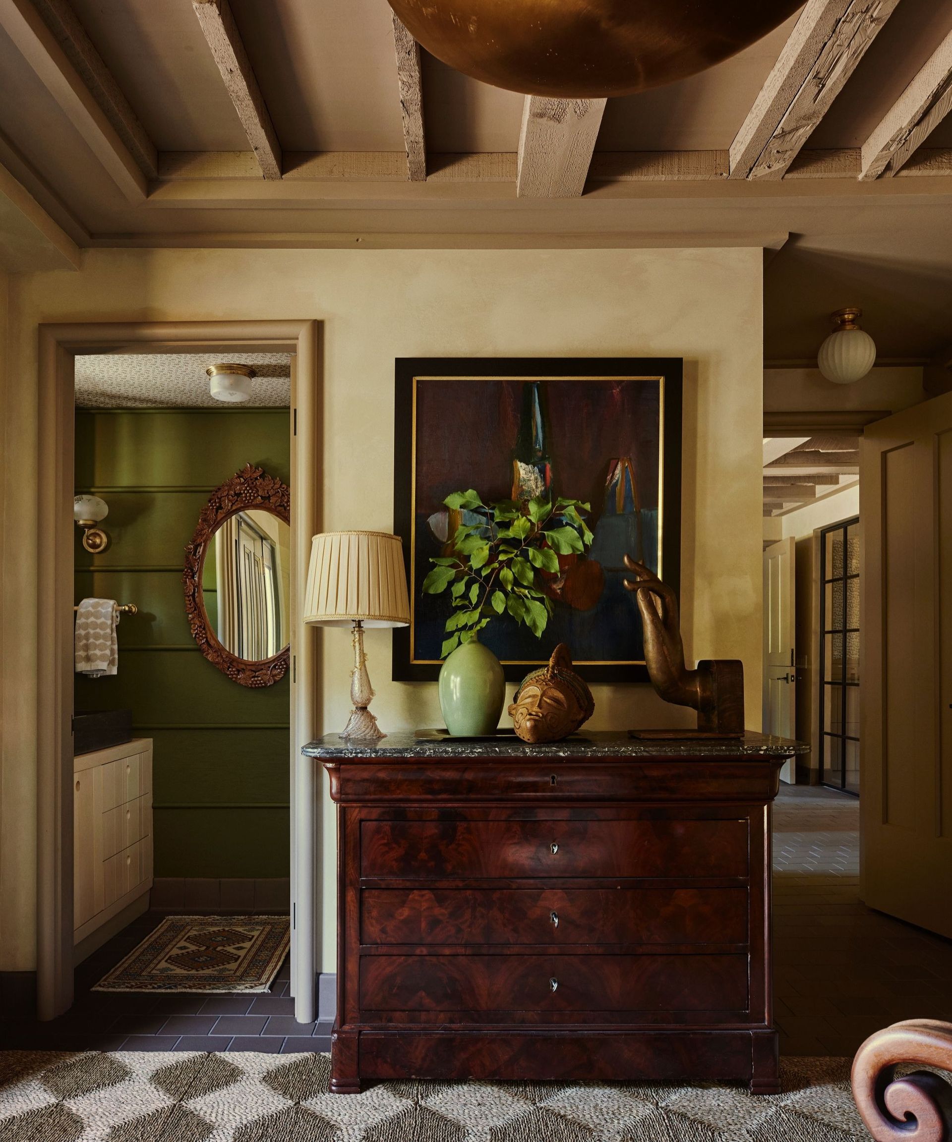 A designer's Canadian chalet home filled with global antiques | Homes ...