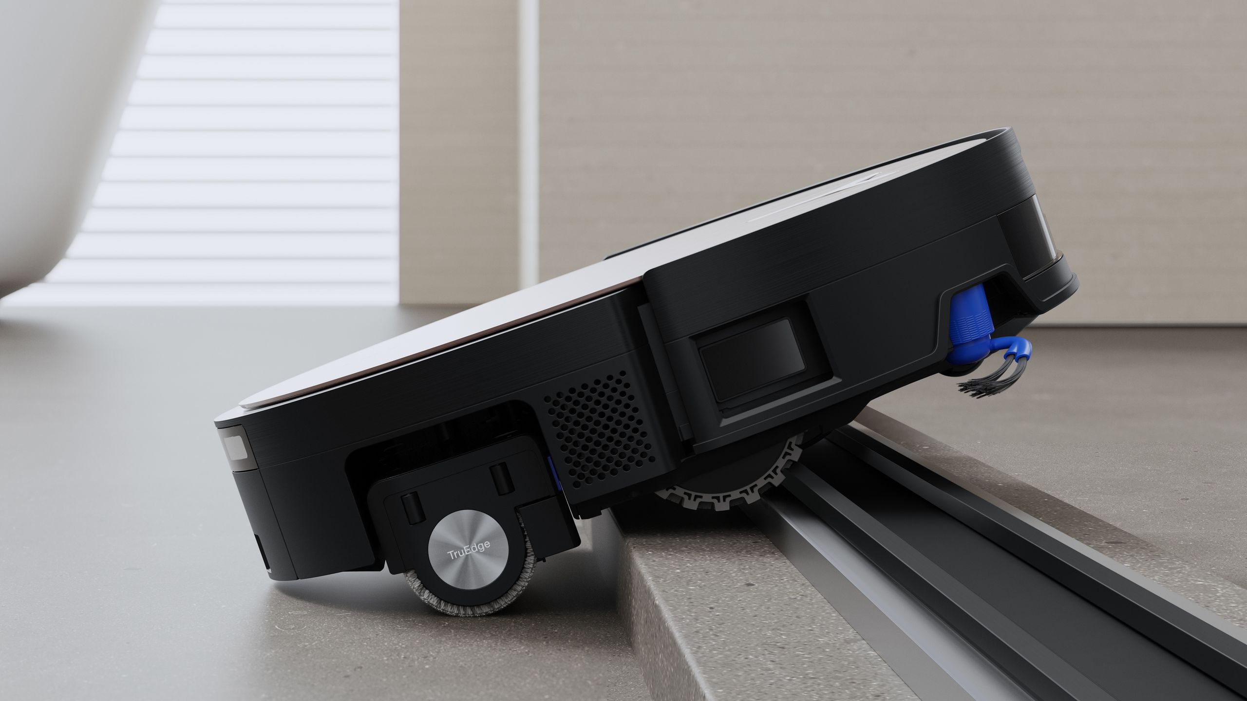 New Ecovacs robot vacuum charges in minutes and climbs where others can ...