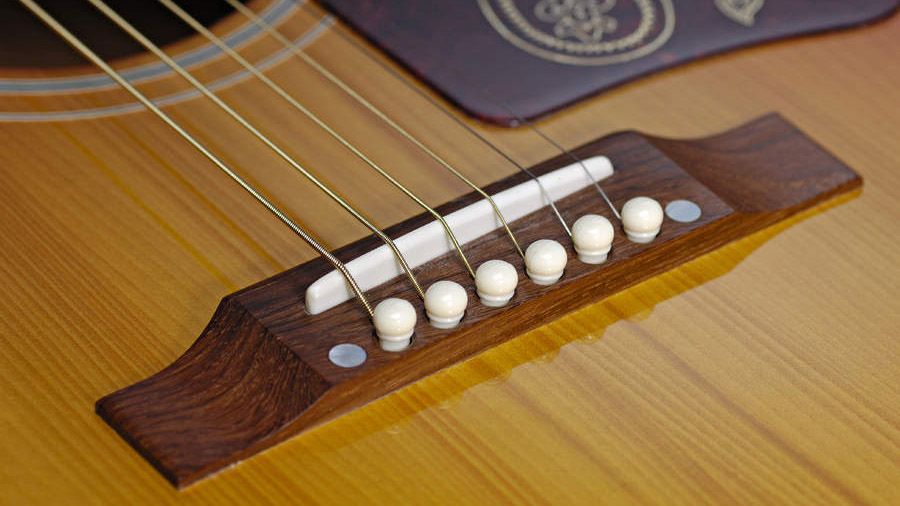 Guitar setup: how to remove bridge pins on an acoustic guitar | MusicRadar