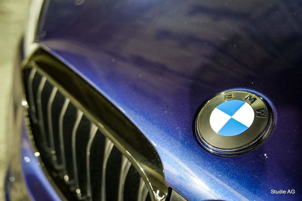 New BMW logo sparks debate as first IRL photos appear online | Creative ...