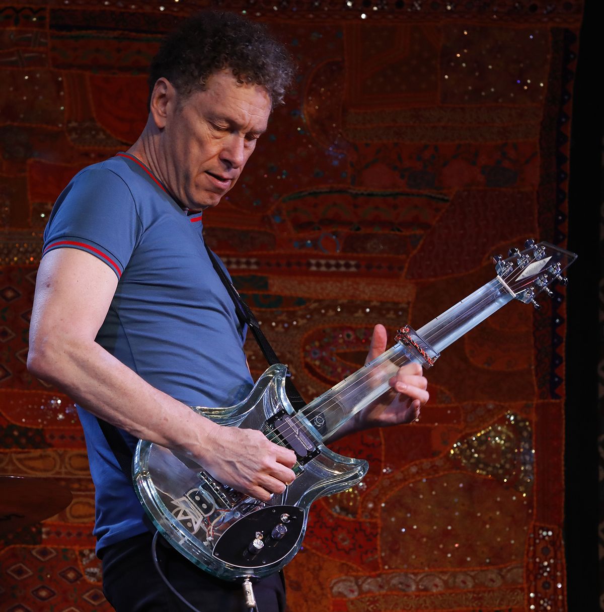 “I saw Adrian Belew playing fretless guitar with King Crimson and I got ...