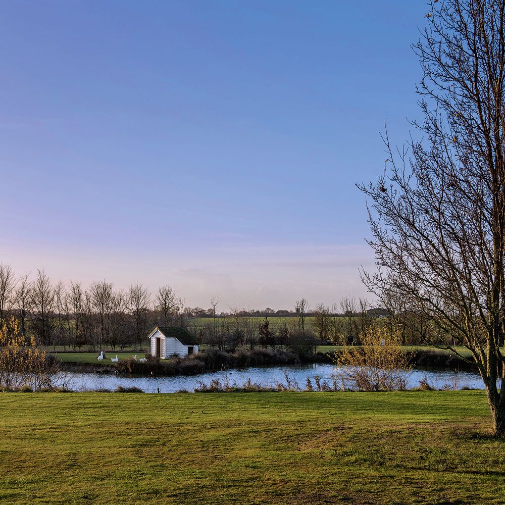 Fall in love with this idyllic weatherboard farmhouse | Ideal Home