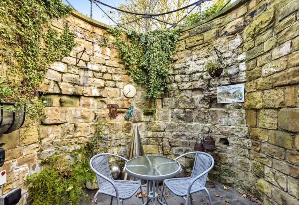 A tiny one-bed Georgian gatehouse with underground living quarters and ...