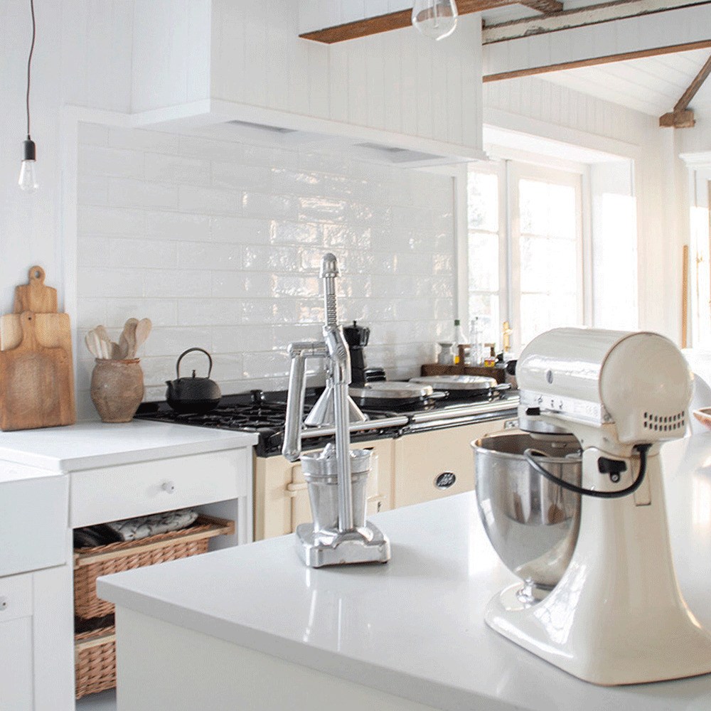 A quirky old rectory on numerous levels celebrates an all-white palette ...