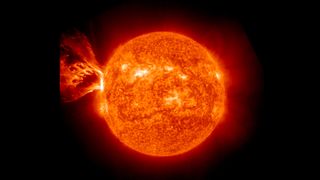 Surprise X-class solar flare from emerging sunspot triggers radio ...
