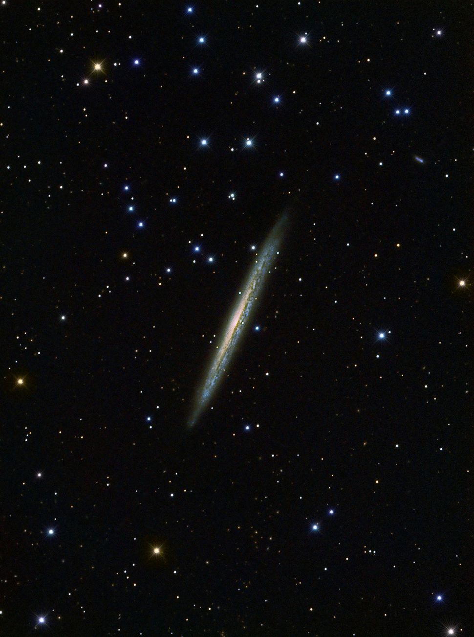 Ouch! Galaxy Cuts Like a Knife in Stunning Image | Space