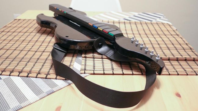 I just tried this new guitar controller — and it's perfect for reliving ...