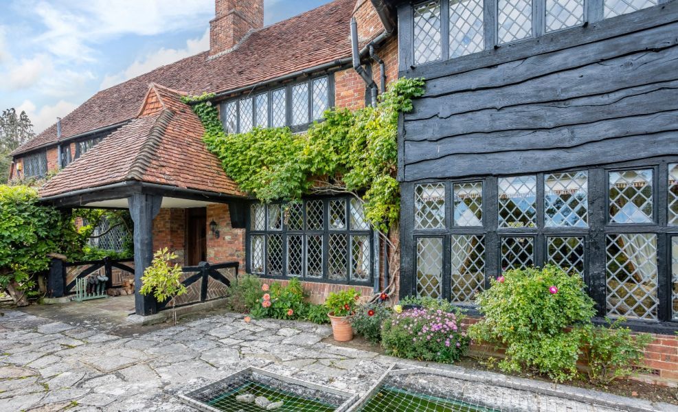 A beautiful medieval-style house and estate in the heart of Surrey's ...