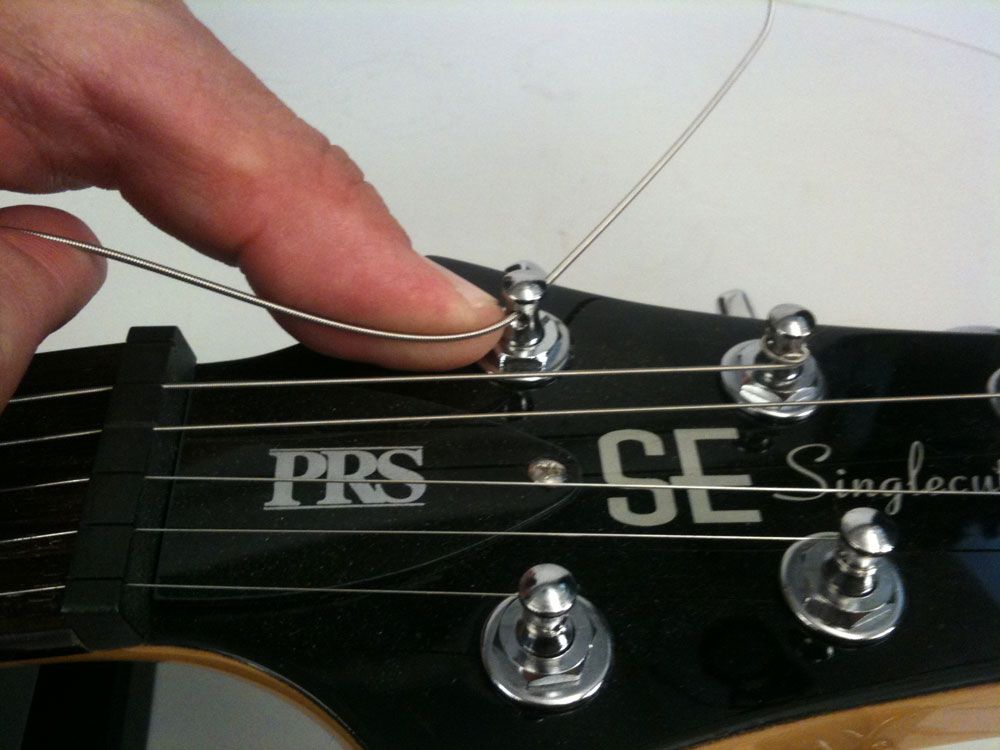 How to Change the Strings on an Electric Guitar — Video | Guitar World