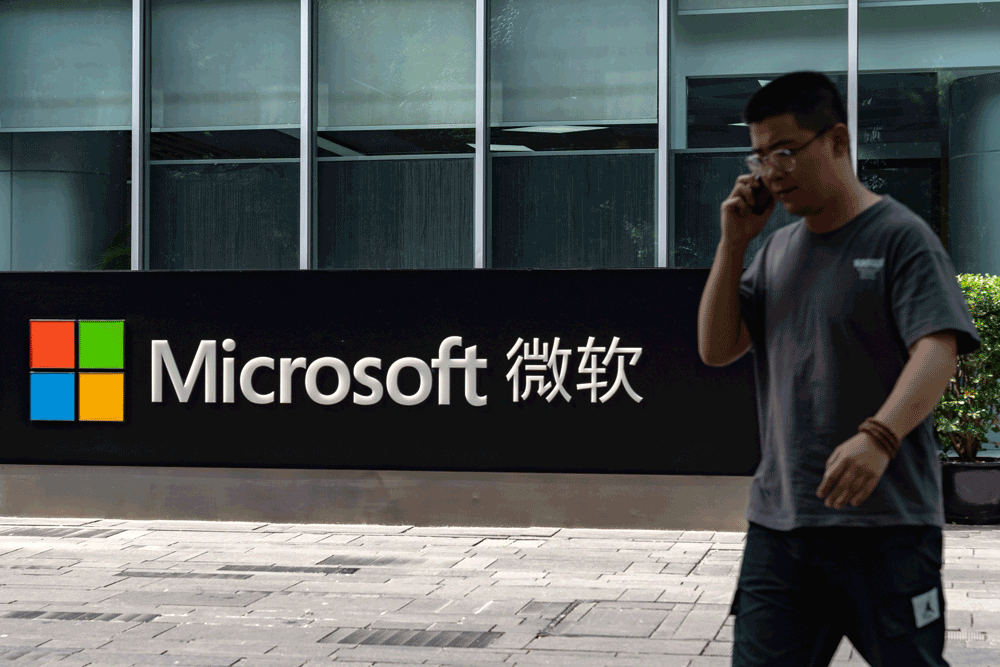 Microsoft told its China staff to use iPhones. Here's why they are ...