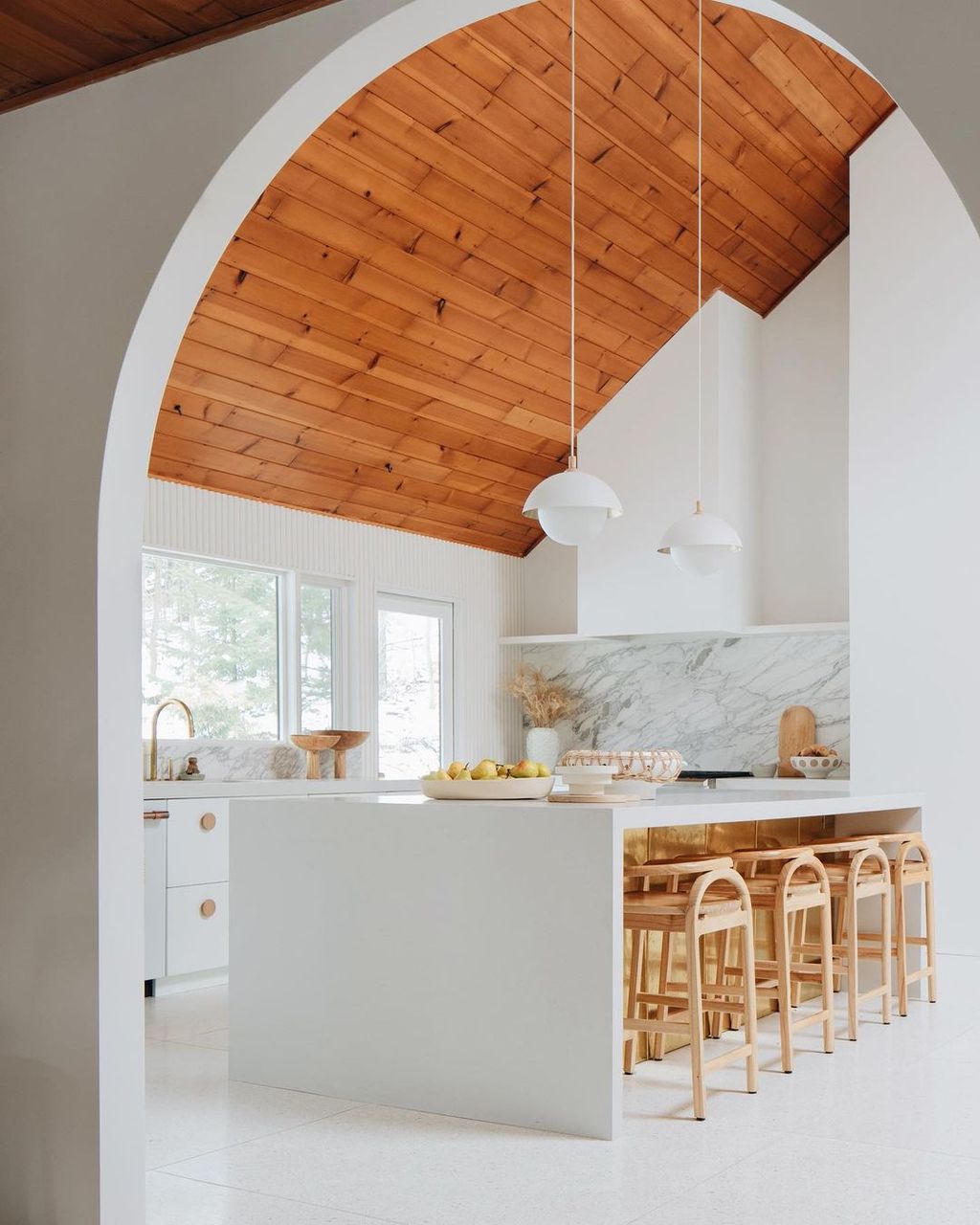 10 waterfall countertop kitchen ideas from top designers | Livingetc