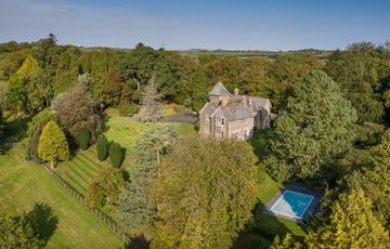 A 16th century hall set in its own private valley in Cornwall that ...