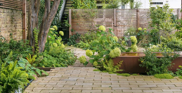 How to make a small garden look bigger: 11 expert tips | Woman & Home