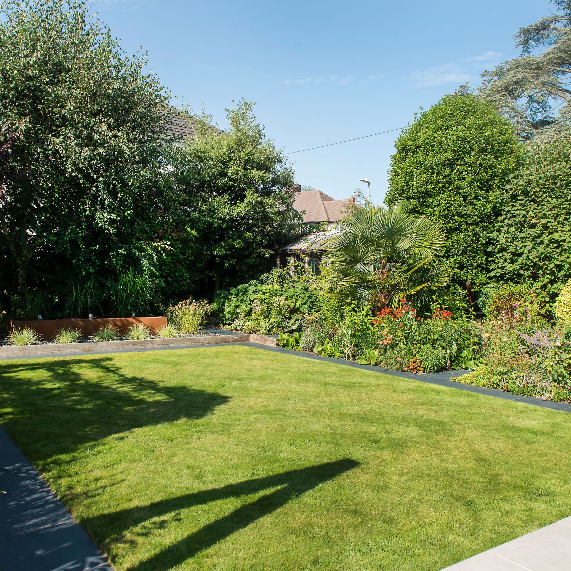 What should I put on my lawn in the summer? Apply these now | Ideal Home